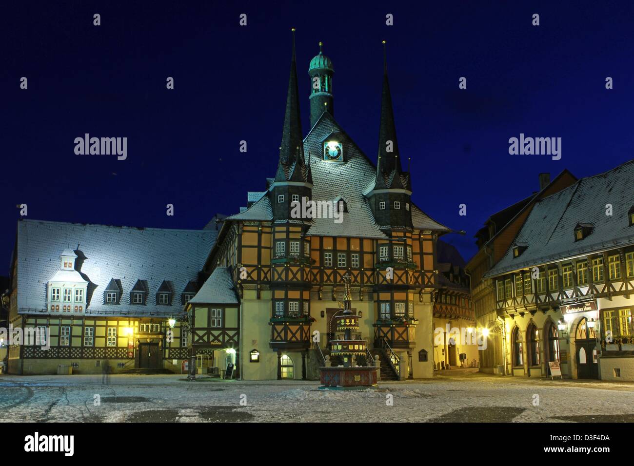 Snow covers the square in front of the historic town hall in ...