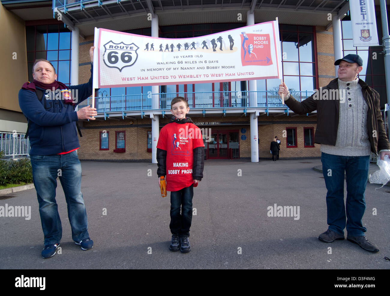 Jonjo Heuerman stands below a banner promoting his ROUTE 66 Charity ...