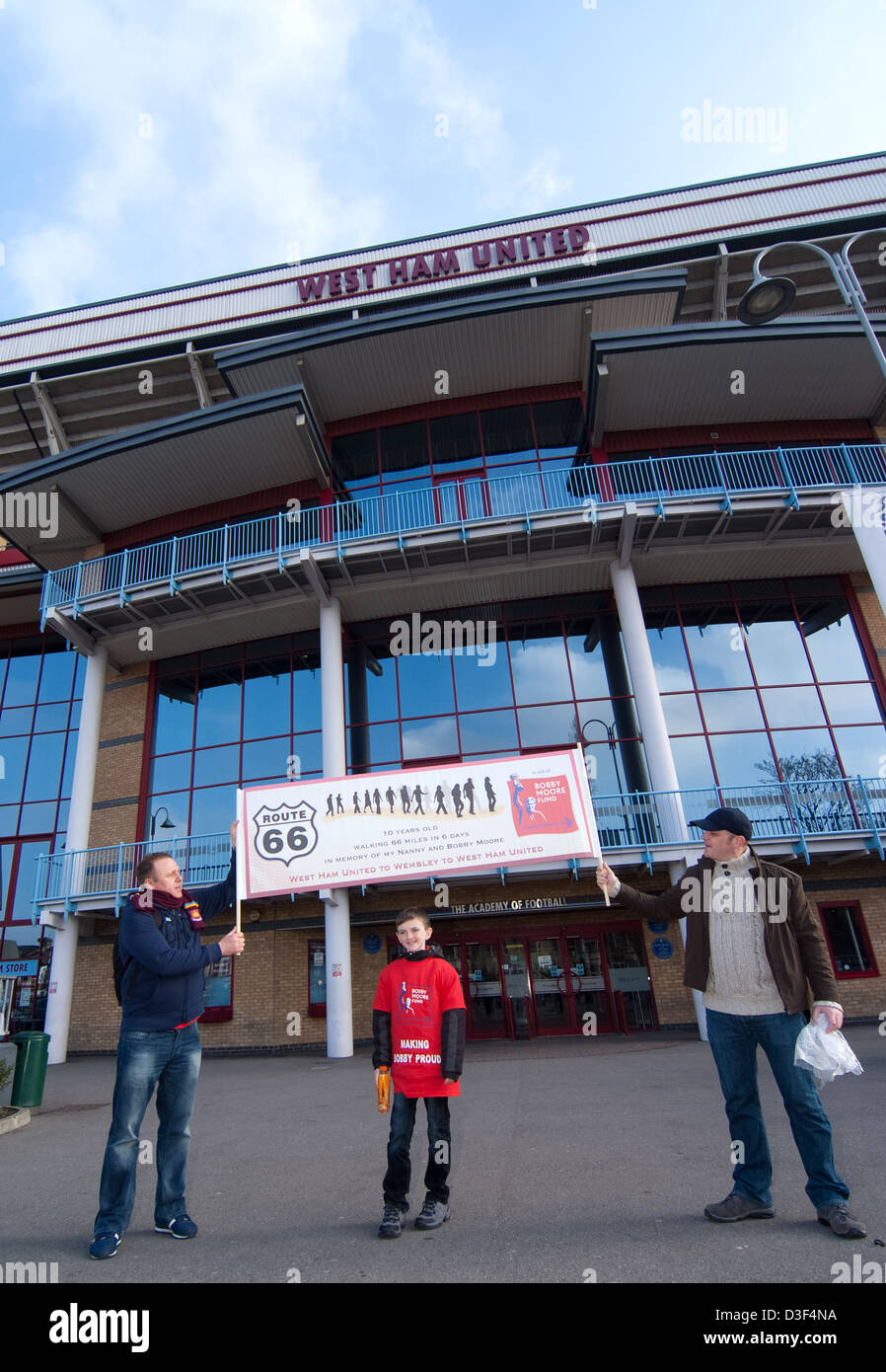 Jonjo Heuerman stands below a banner promoting his ROUTE 66 charity ...