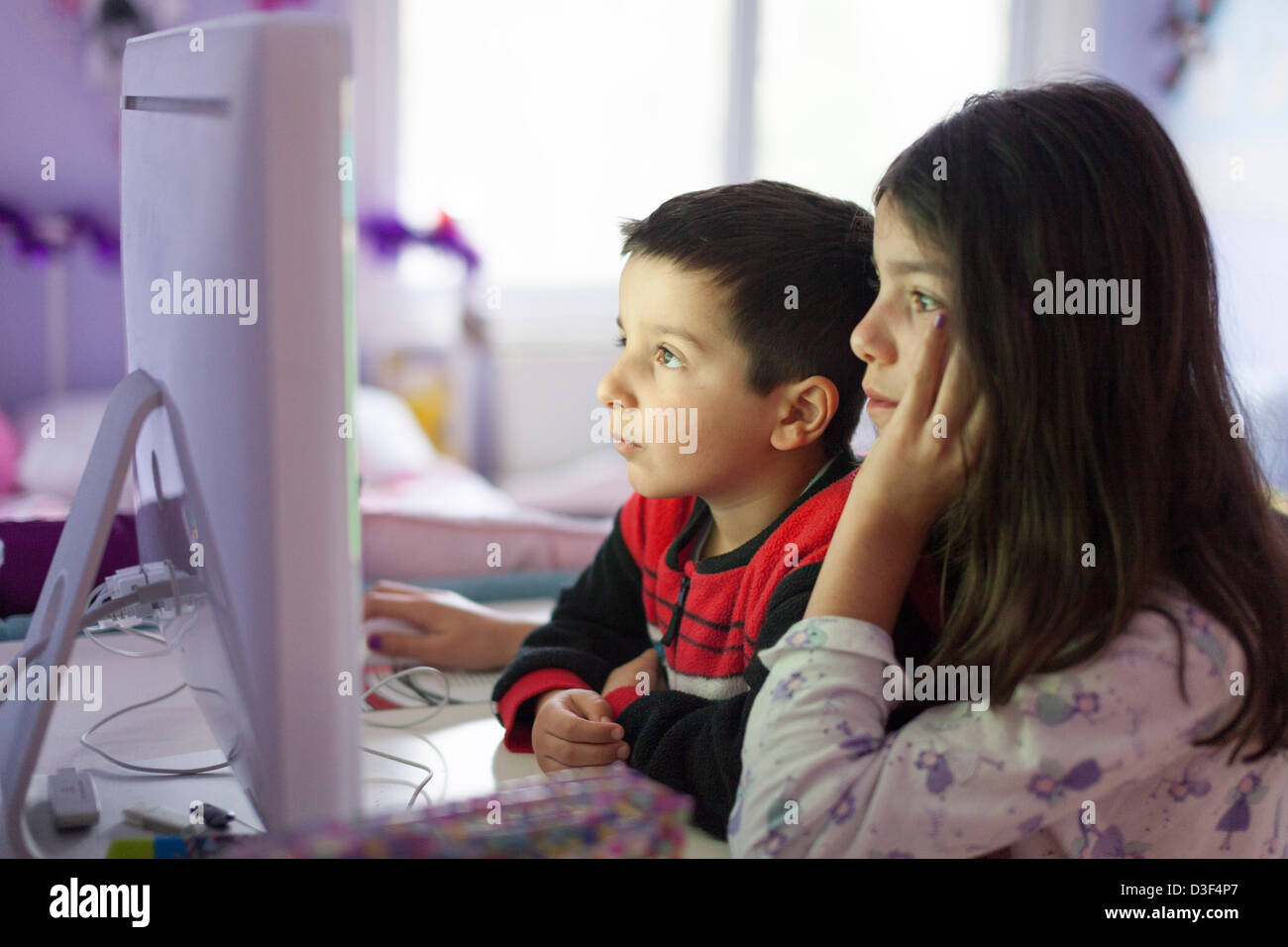 Children browsing the Internet together Stock Photo - Alamy
