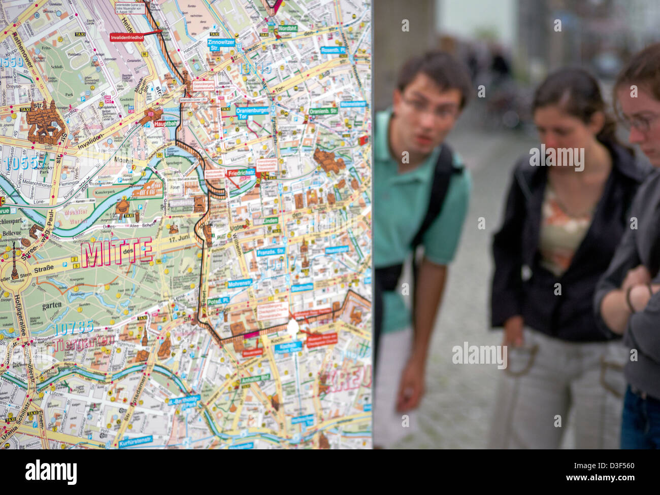 Berlin, Germany, tourists look at a city map of Berlin Stock Photo - Alamy
