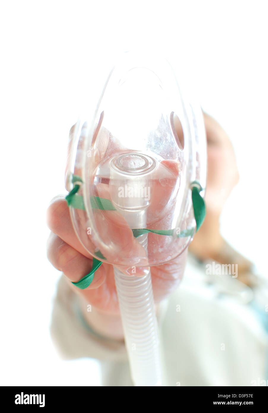 Female assisitant giving gas mask to patient Stock Photo - Alamy