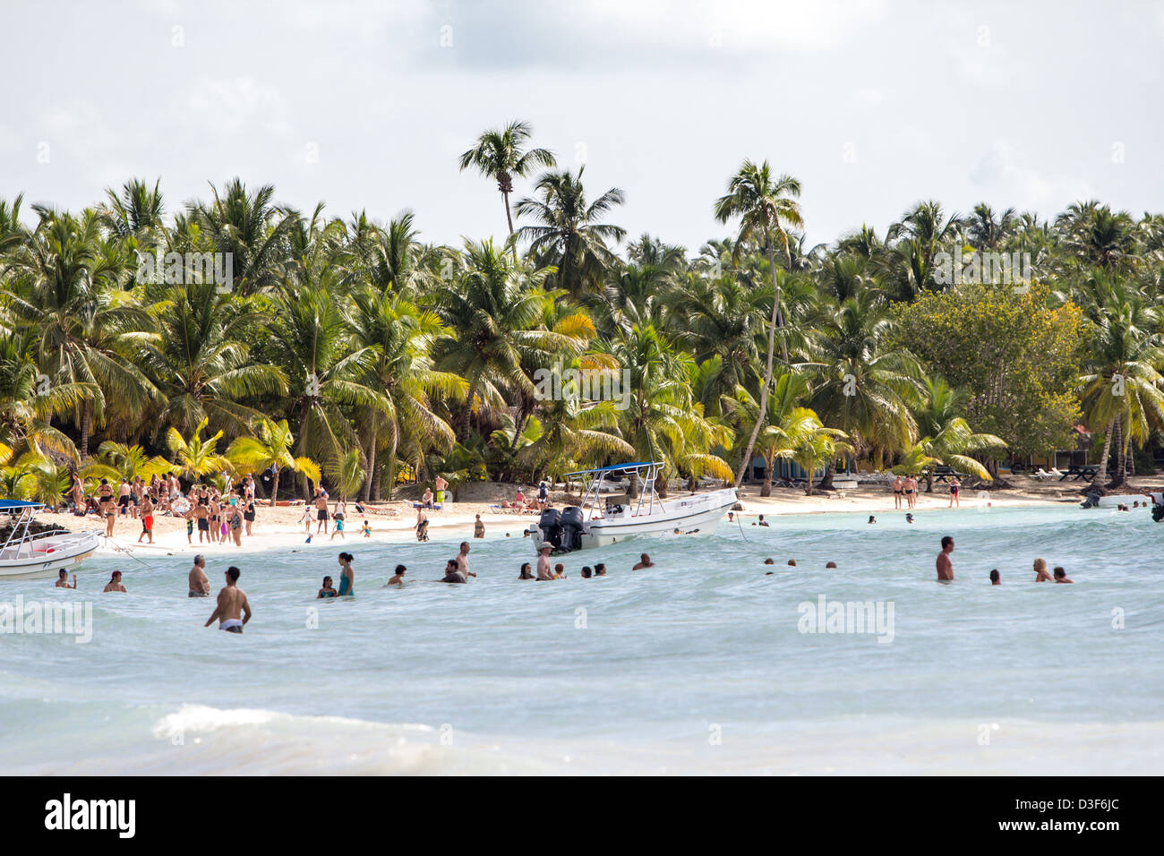 People bathe in the Caribbean Sea, Island Saona, Dominican Republic ...