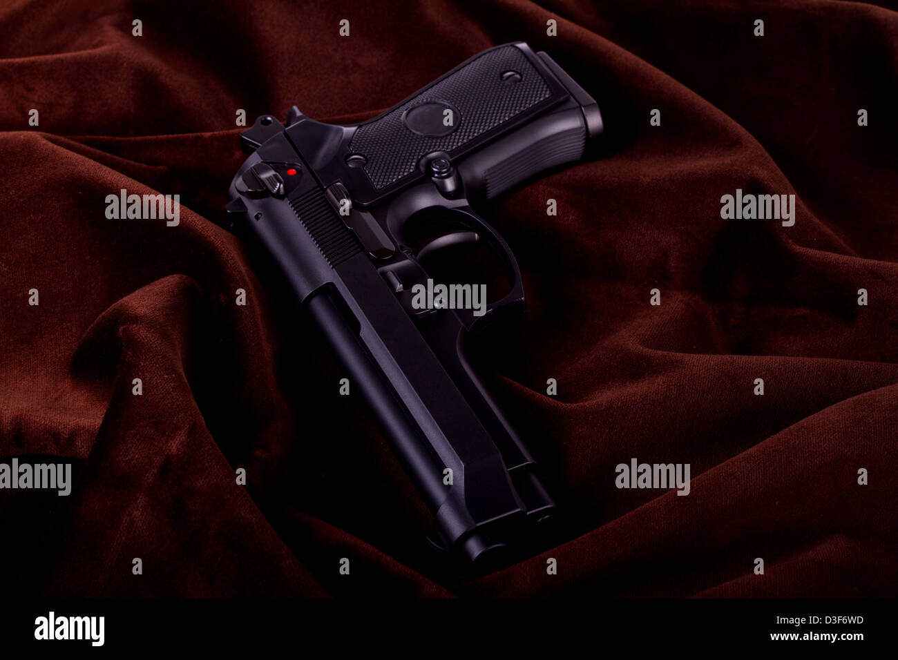 Detail view of a realistic airsoft gun isolated on a white background ...