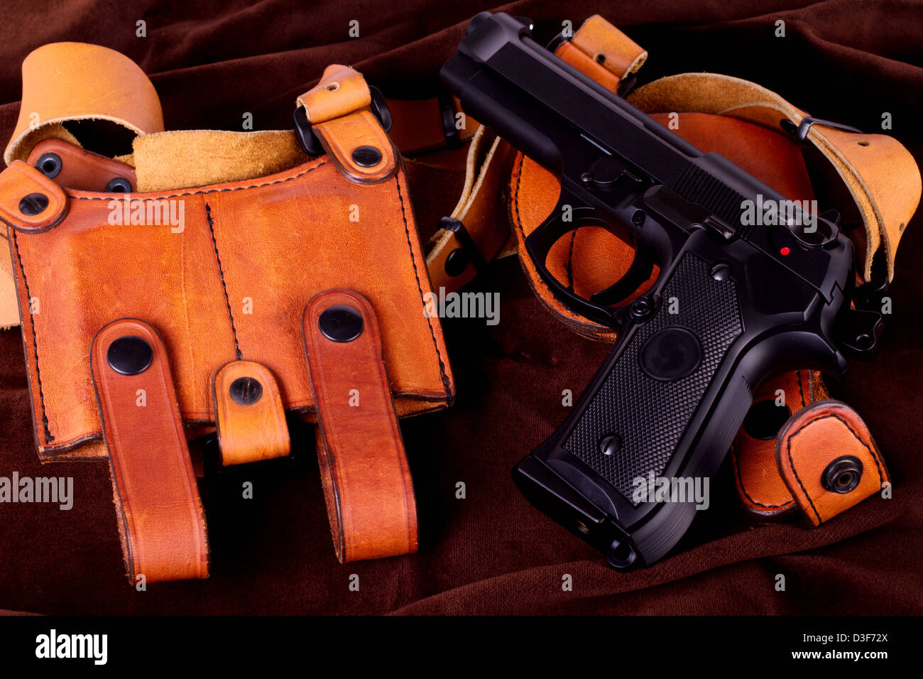 Detail view of a realistic airsoft gun isolated on a white background ...