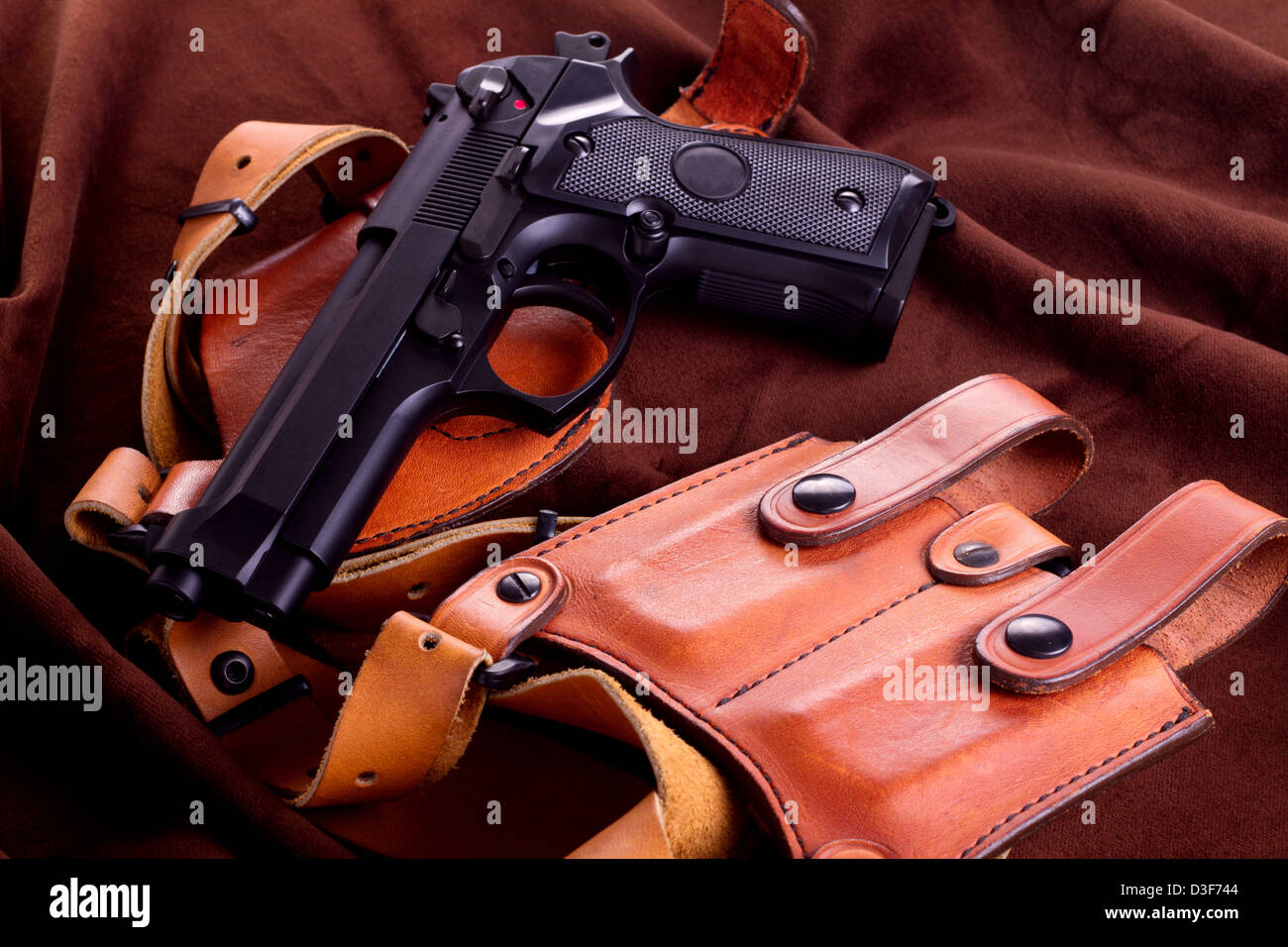 Detail view of a realistic airsoft gun isolated on a white background ...