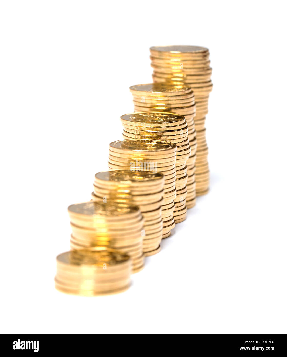 Columns of golden coins isolated on white Stock Photo - Alamy
