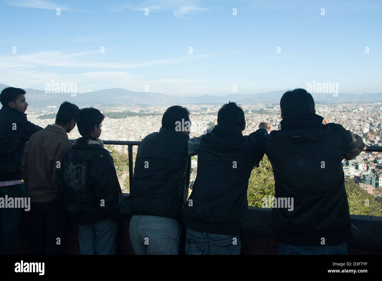 Group of people looking out over Kathmandu Stock Photo - Alamy