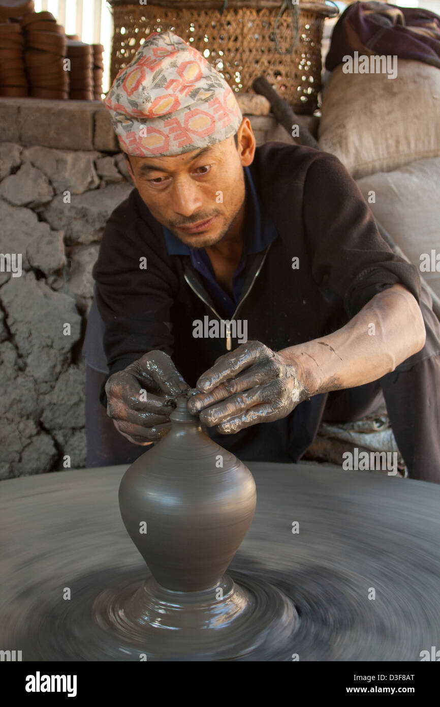 Ethnic potter at work throwing a pot Stock Photo - Alamy