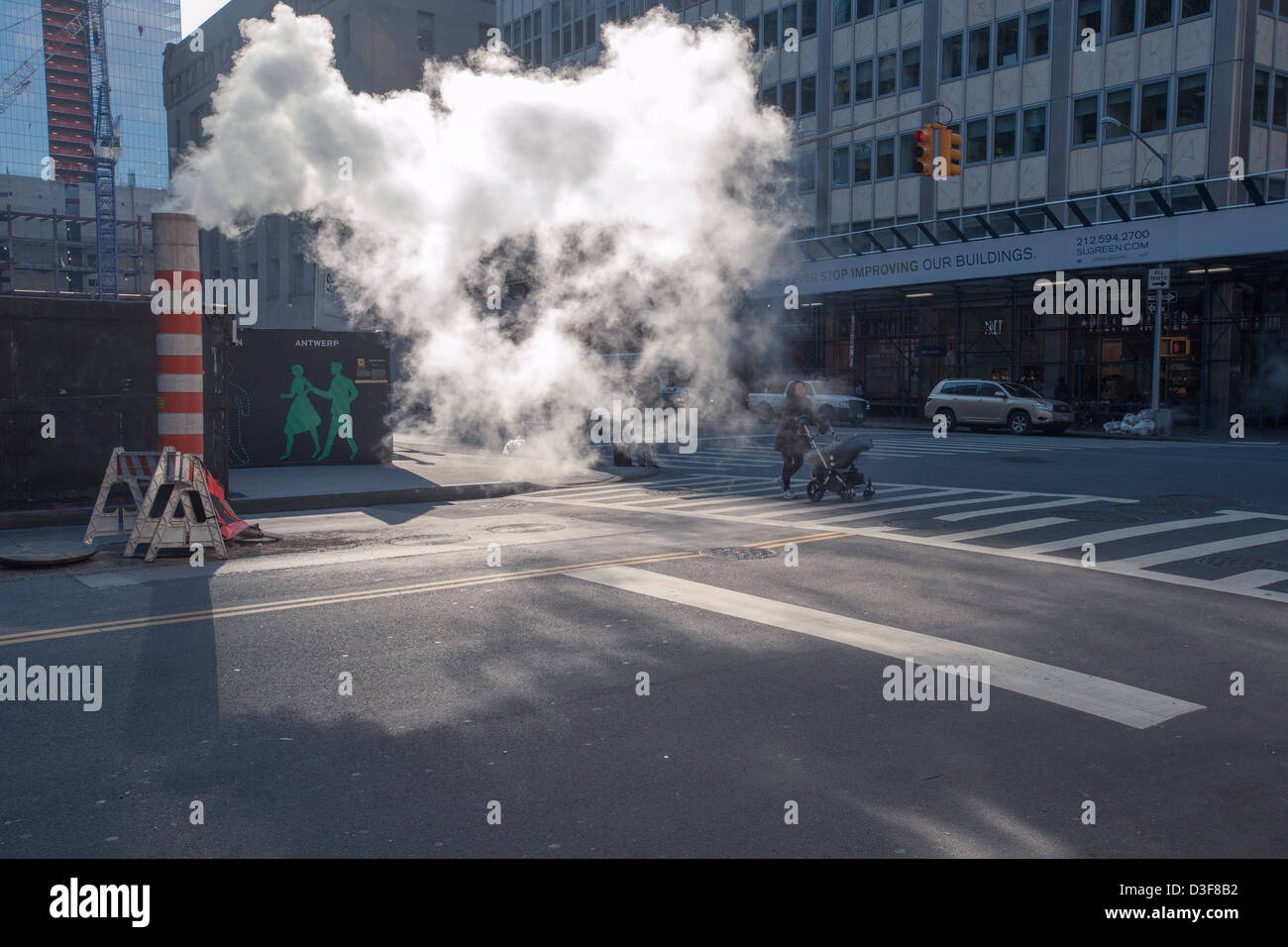 A Con Edison manhole vents excess steam in Lower Manhattan in New York ...