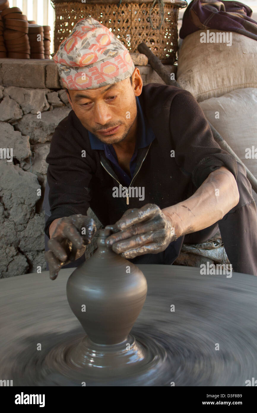 Ethnic potter at work throwing a pot Stock Photo - Alamy