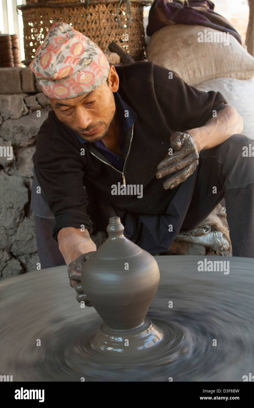 Ethnic potter at work throwing a pot Stock Photo - Alamy