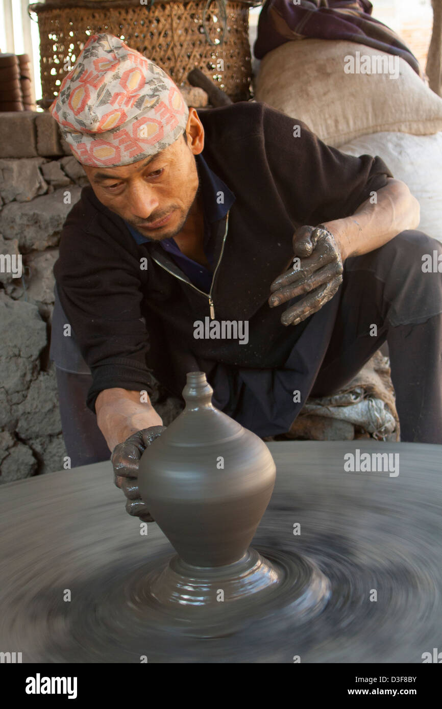 Ethnic potter at work throwing a pot Stock Photo - Alamy