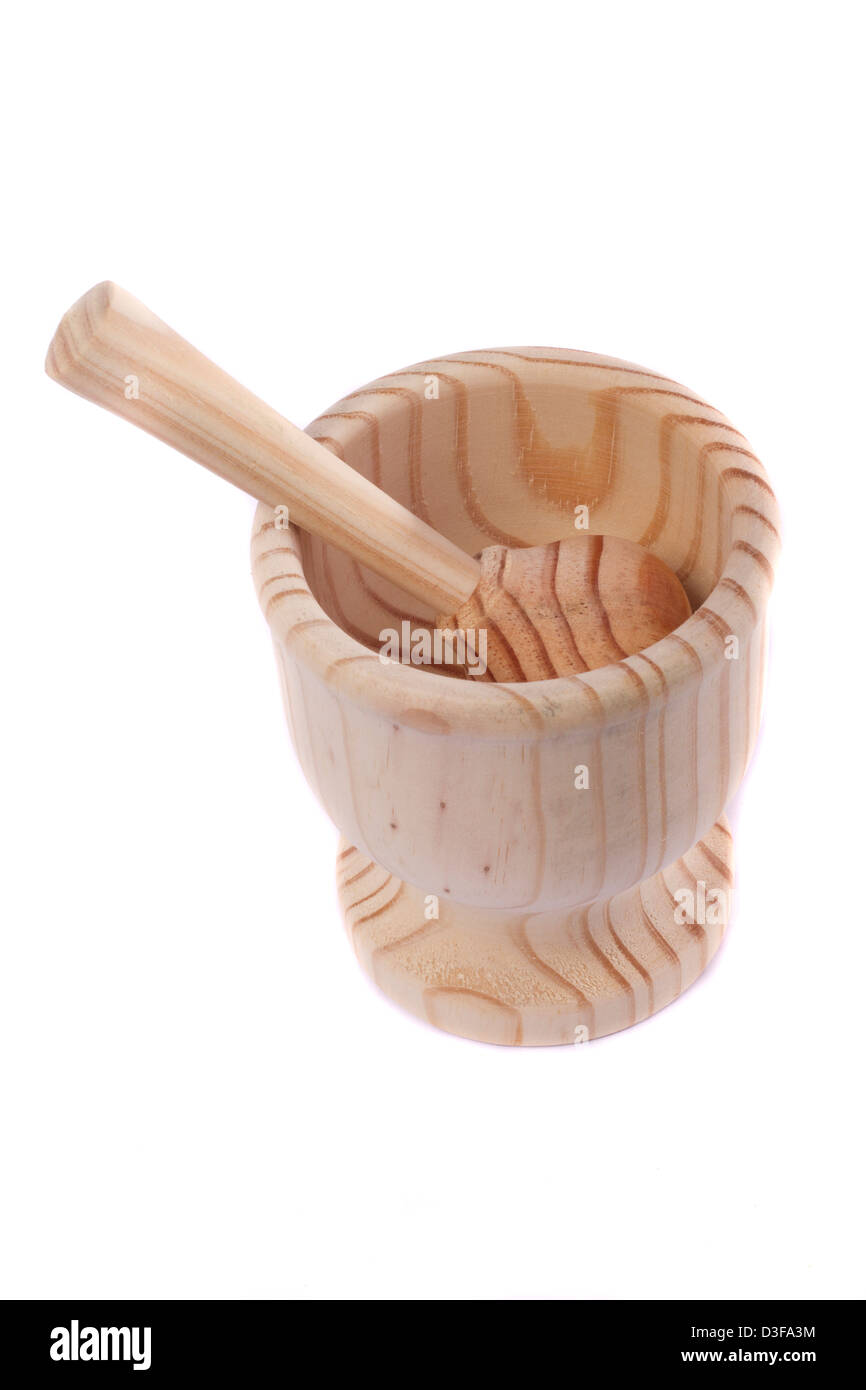 Close up view detail of a wooden garlic smasher isolated on a white ...