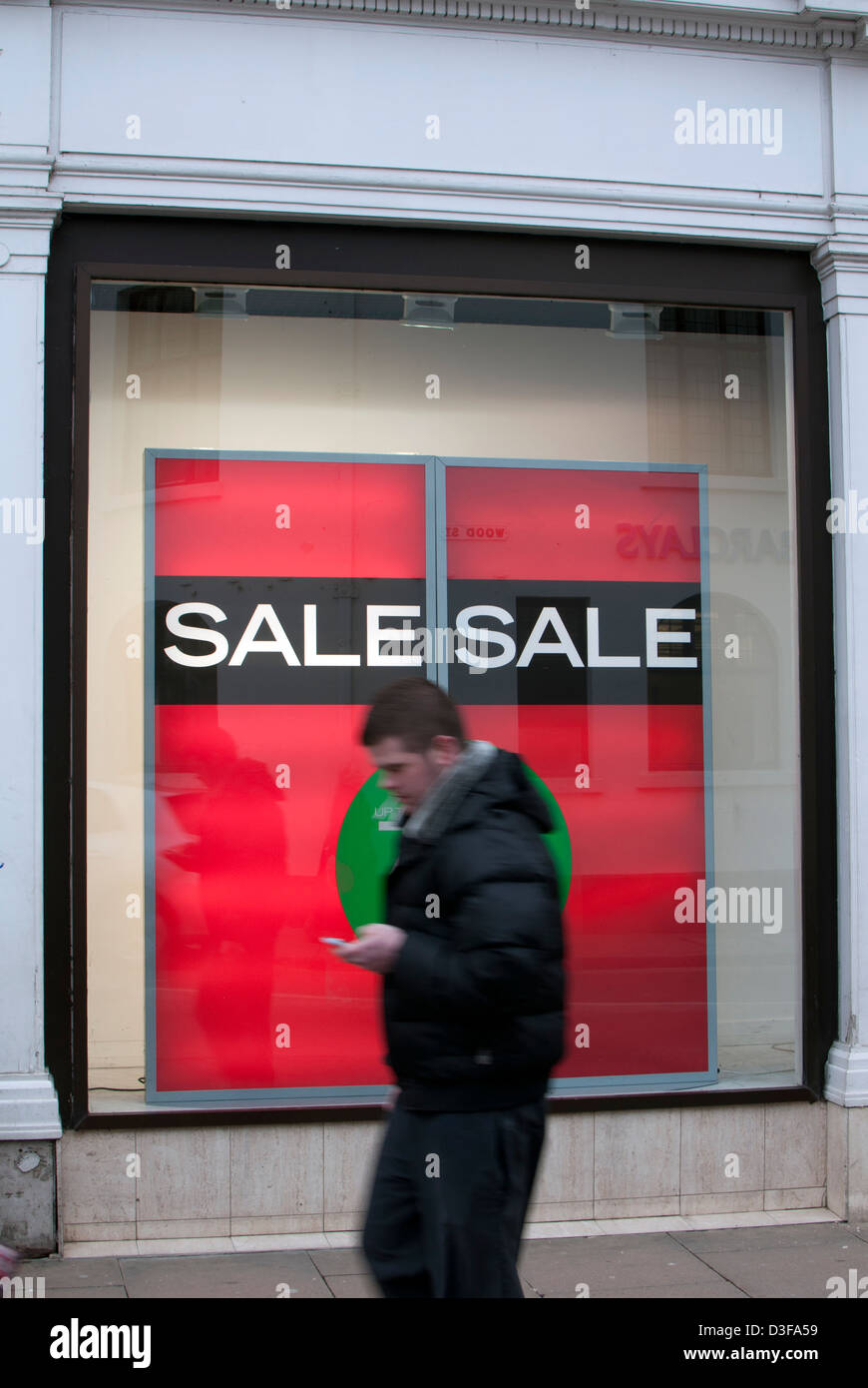 Sale notice in shop window Stock Photo - Alamy