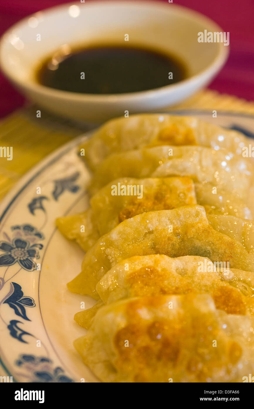 Pot Sticker appetizer and dipping sauce Stock Photo - Alamy