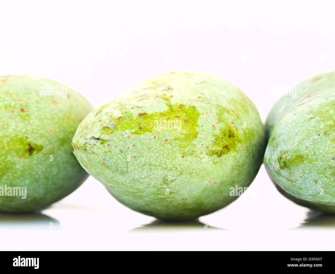 Green mangoes hi-res stock photography and images - Alamy