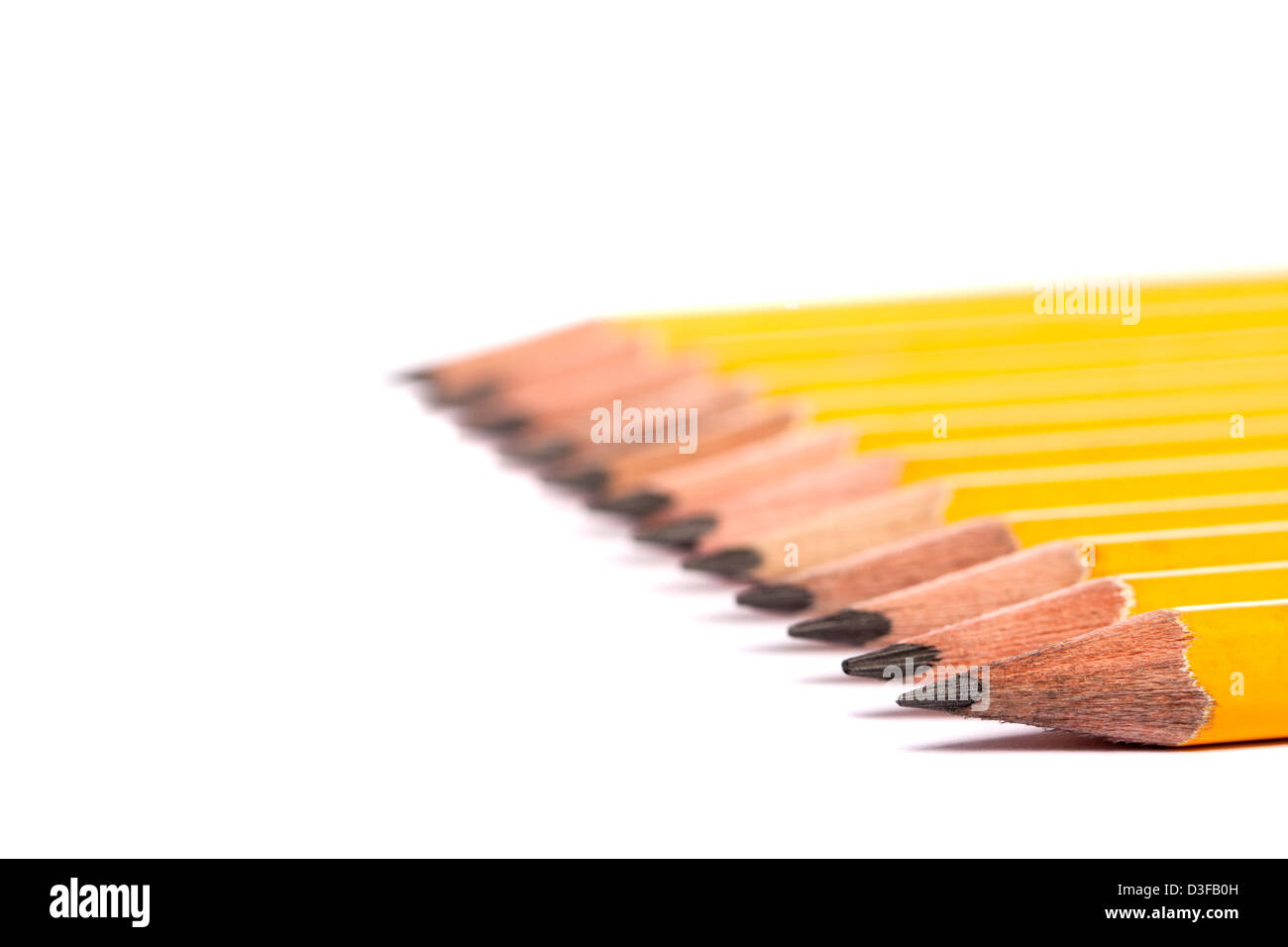Close up view of a bunch of yellow pencils isolated on a white ...