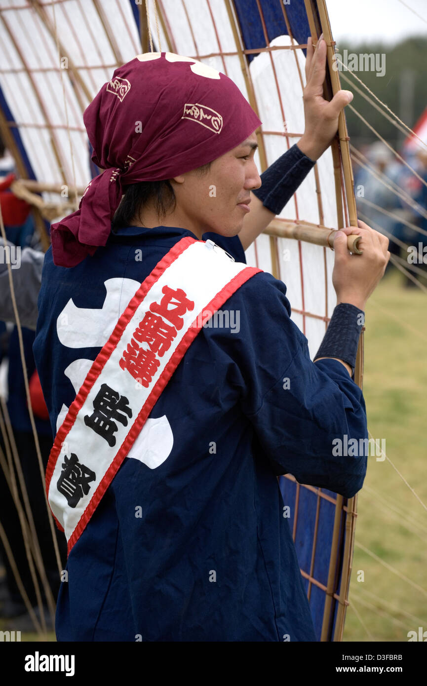 Kite flying team members hold kite prior to launch at Hamamatsu Takoage ...
