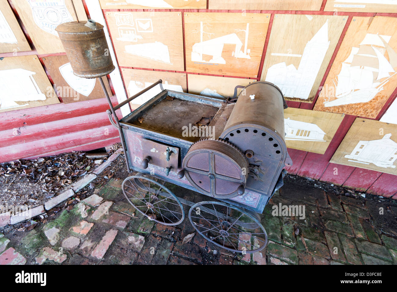 An old rusted Roasted Peanut Cart sits on display in downtown Warm ...