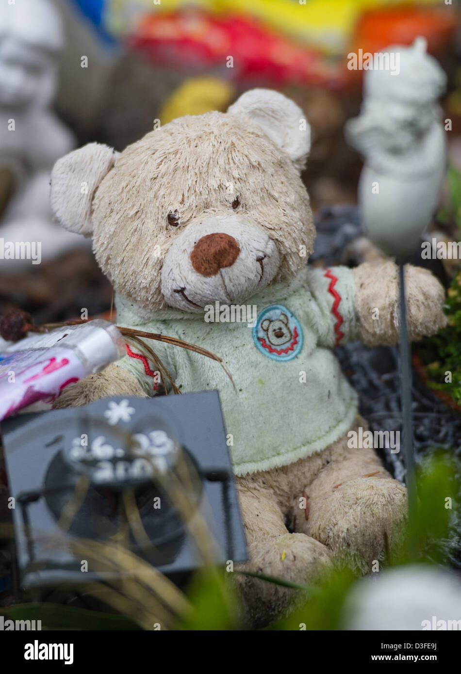 A teddy bear sits at a burial site for stillborns at the Bergfriedhof ...