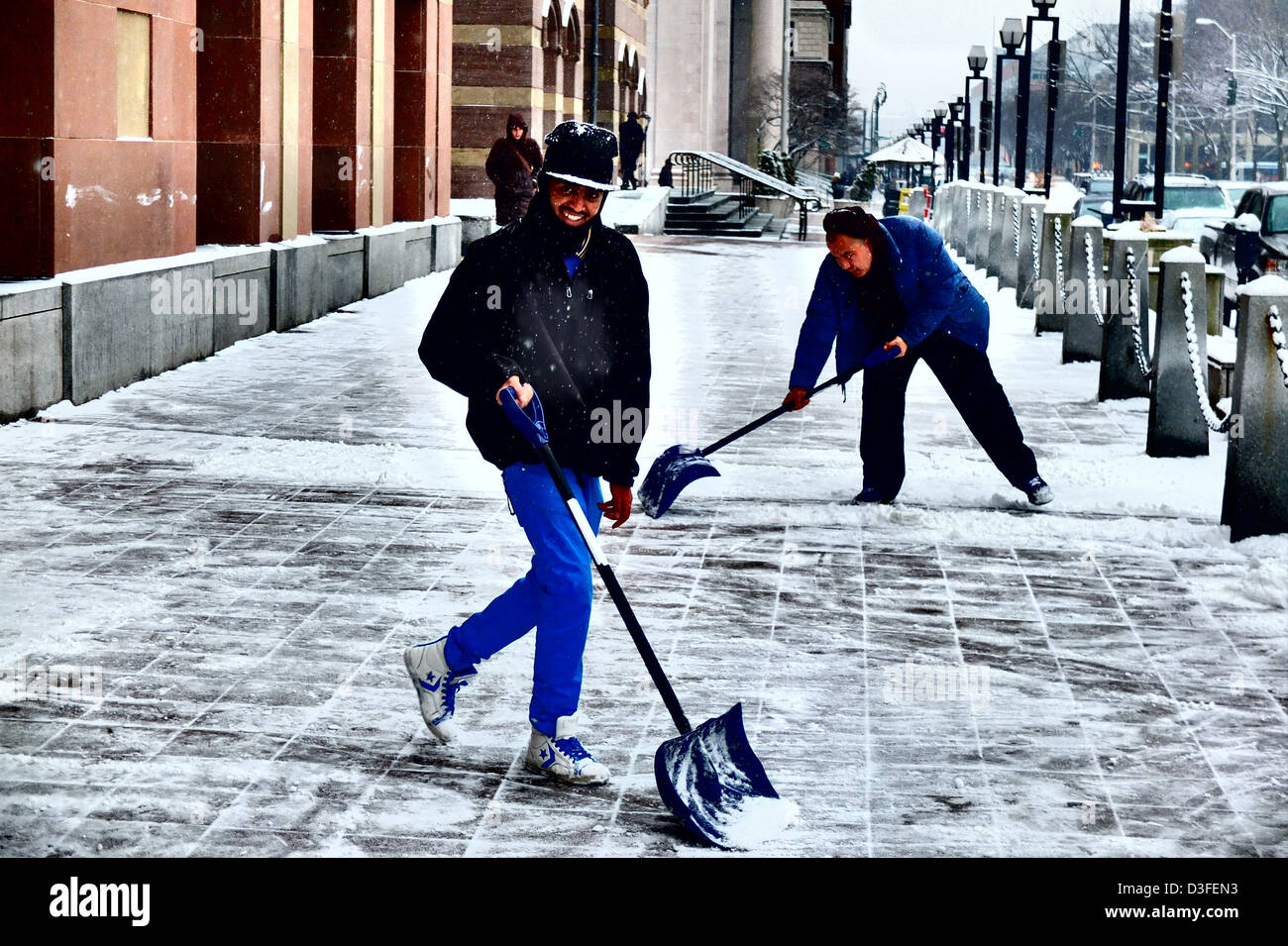 Men shoveling sidewalk in New Haven CT in front of City Hall Stock ...