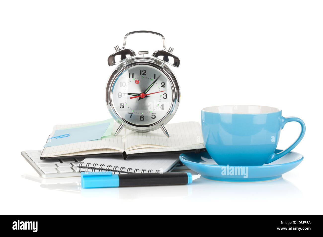 Blue coffee cup, alarm clock and office supplies. Isolated on white ...