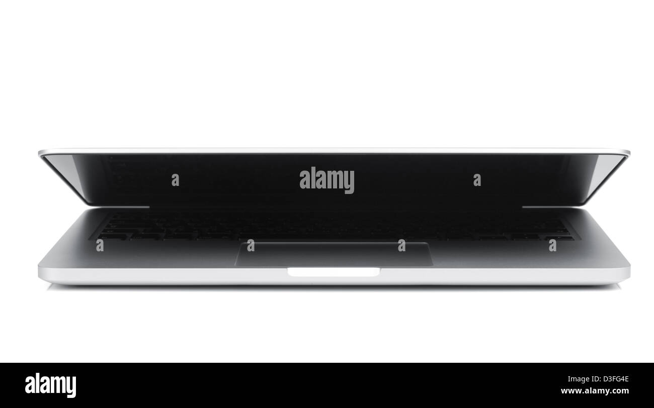 Slightly opened laptop. Isolated on white background Stock Photo - Alamy