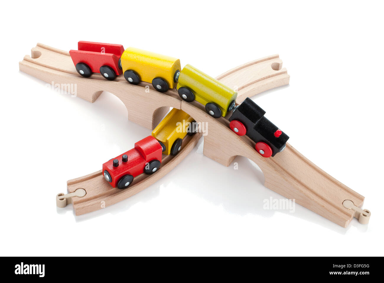 Wooden toy trains. Isolated on white background Stock Photo - Alamy