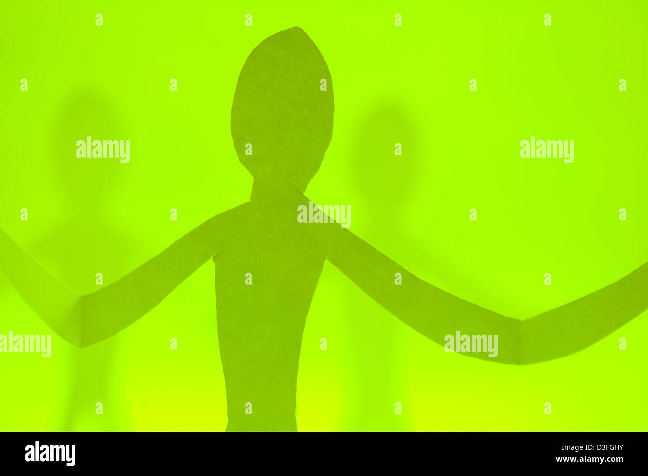 small rudimentary figures of man in paper Stock Photo - Alamy