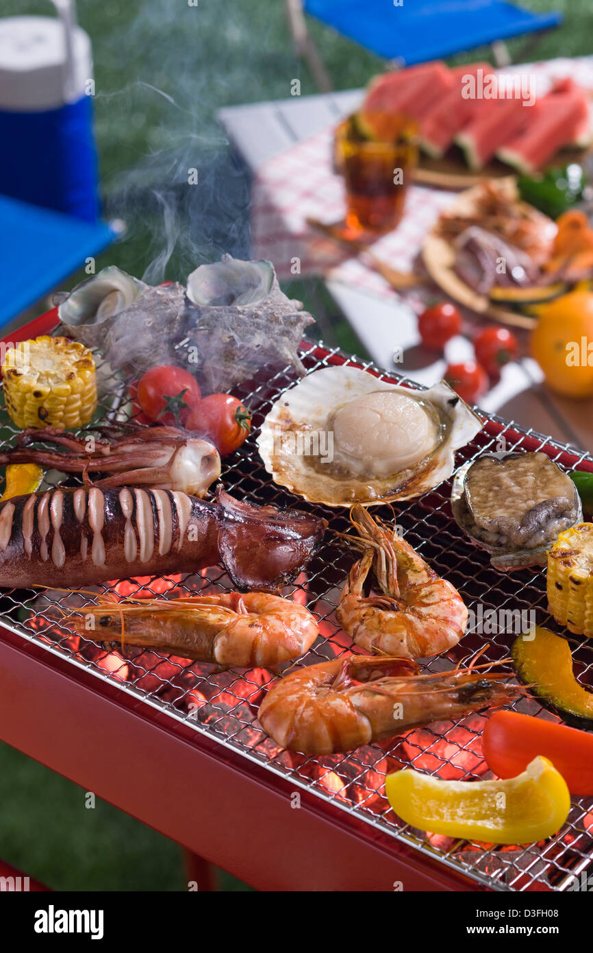 Seafood Grilled on Barbecue Grill Stock Photo - Alamy