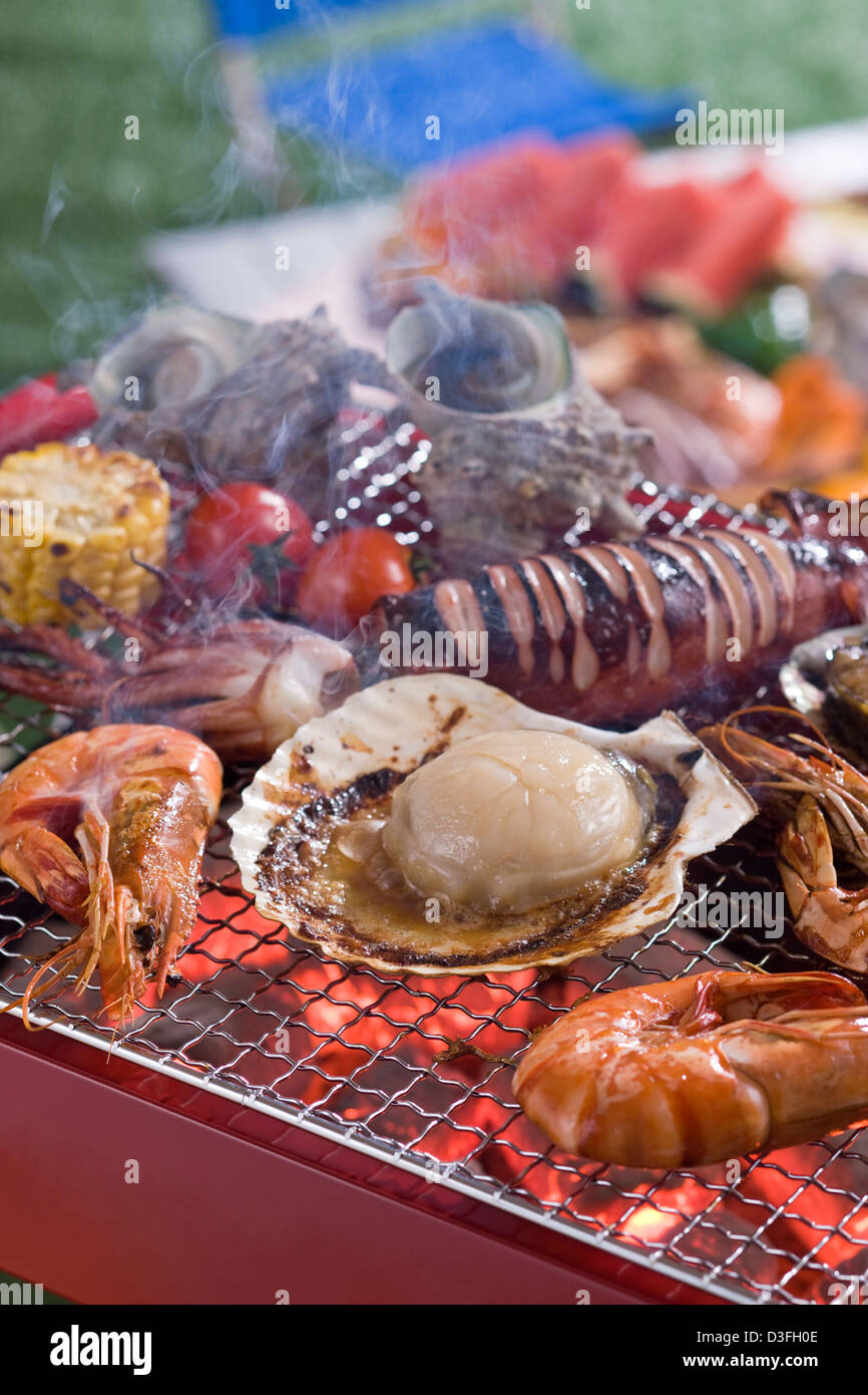 Seafood Grilled on Barbecue Grill Stock Photo - Alamy