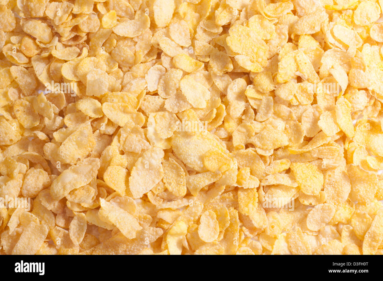 Corn flakes background texture closeup Stock Photo - Alamy