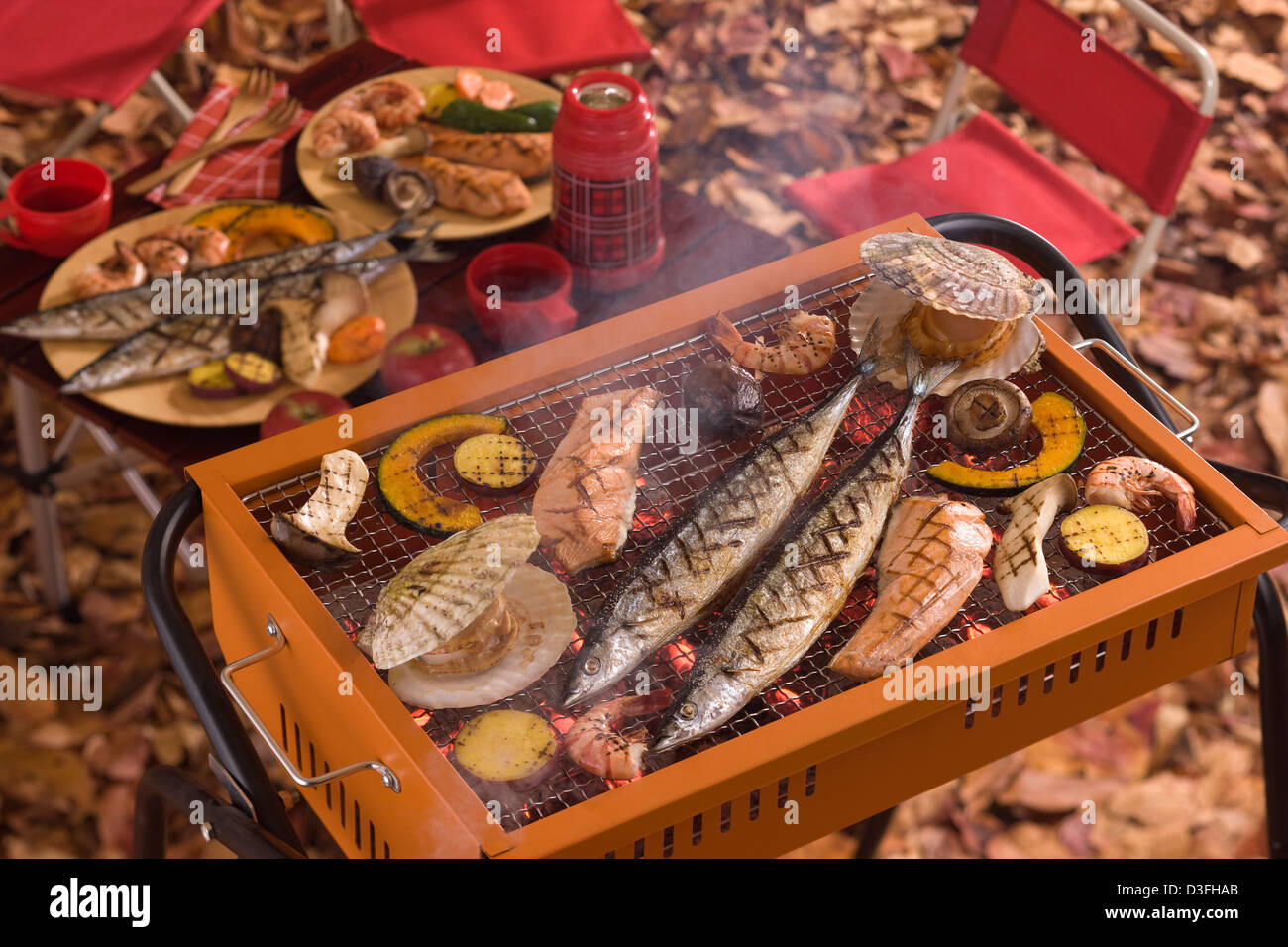 Seafood Grilled on Barbecue Grill in Autumn Stock Photo - Alamy