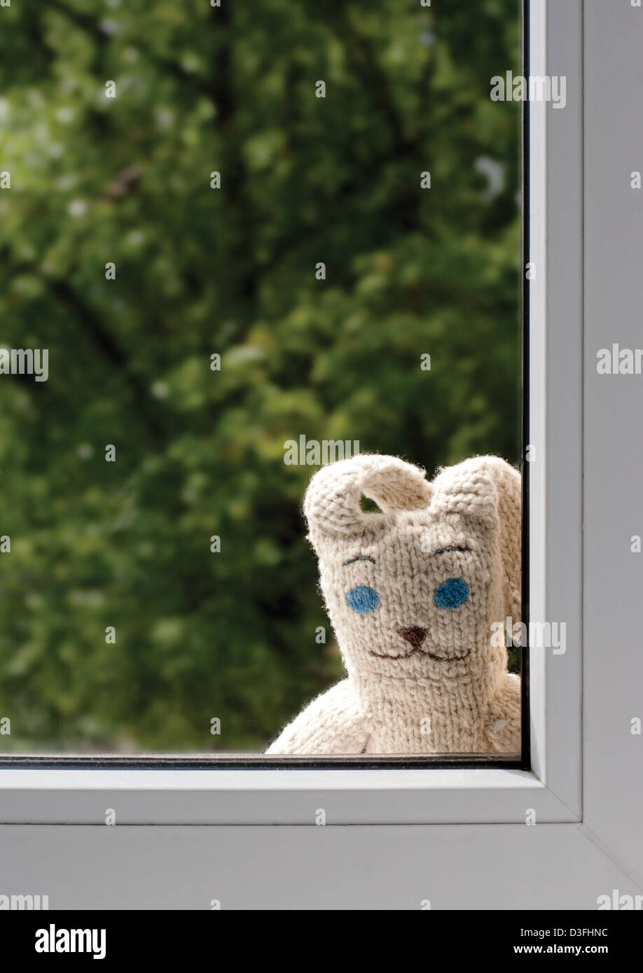 sad toy rabbit outside Stock Photo - Alamy