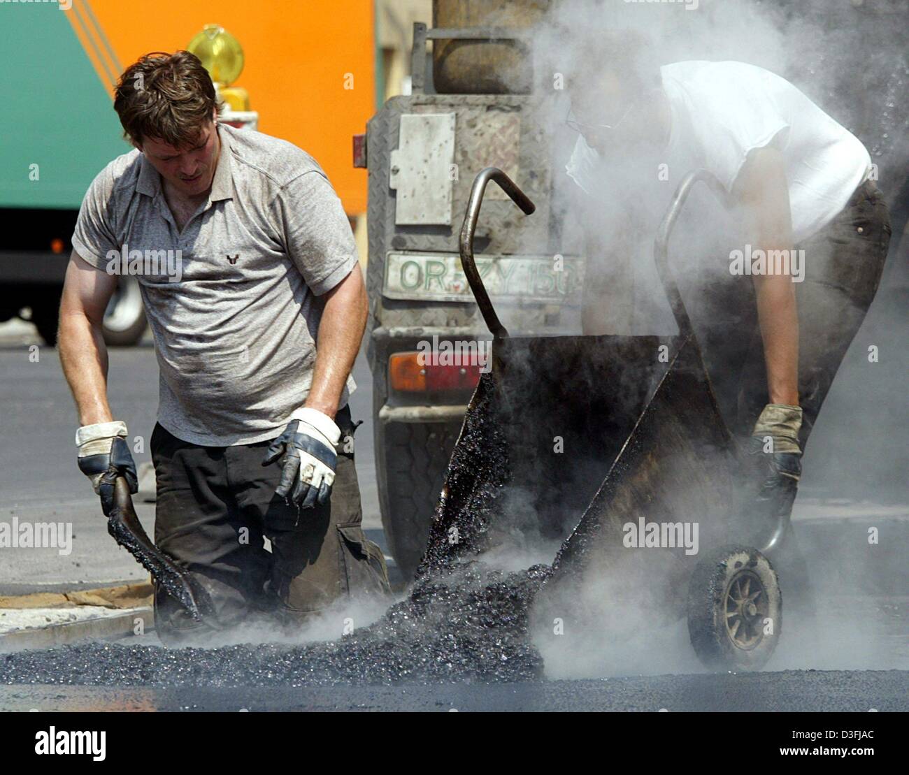 Labour lab employment bitumen tar employee steam heat germany hi-res ...