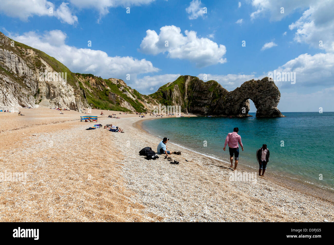 Durdle Door (sometimes written Durdle Dor) is a natural limestone arch ...