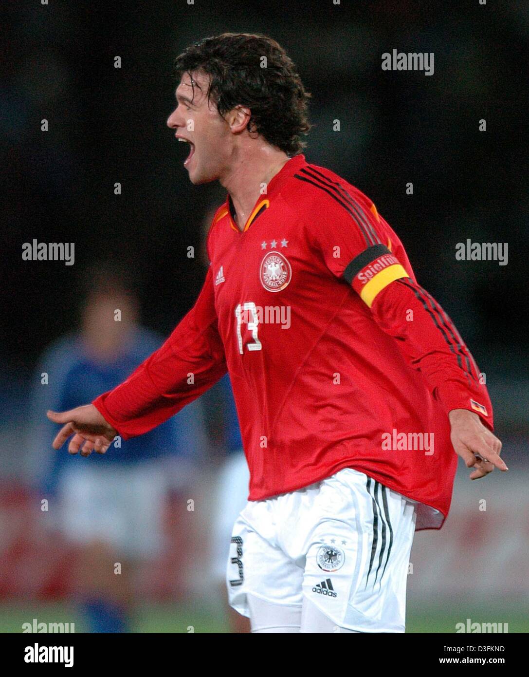 (dpa) - German midfielder and team captain Michael Ballack celebrates ...