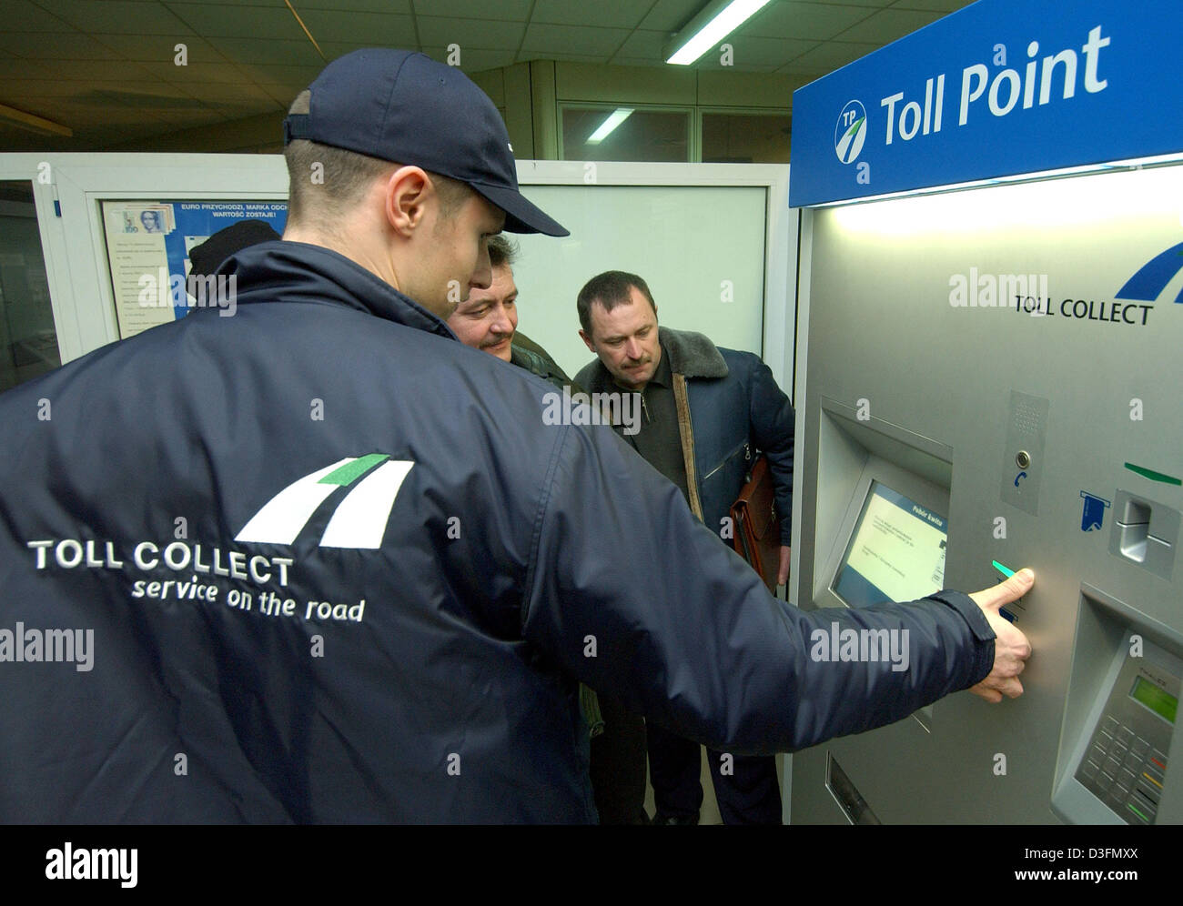 An employee of German highway toll company Toll Collect shows two ...