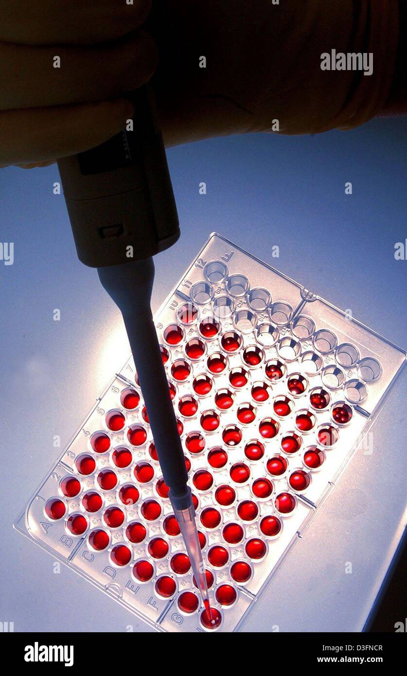 (dpa) - A sample is taken from a pallette of different food colours for ...