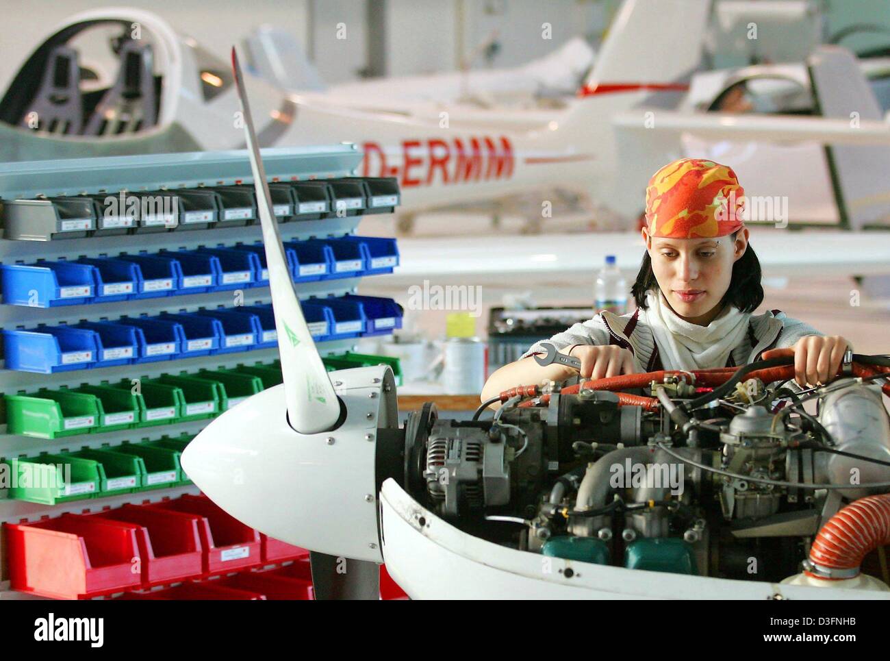(dpa) - Apprentice Romi Wunderlich works on an Aquila A210 single ...