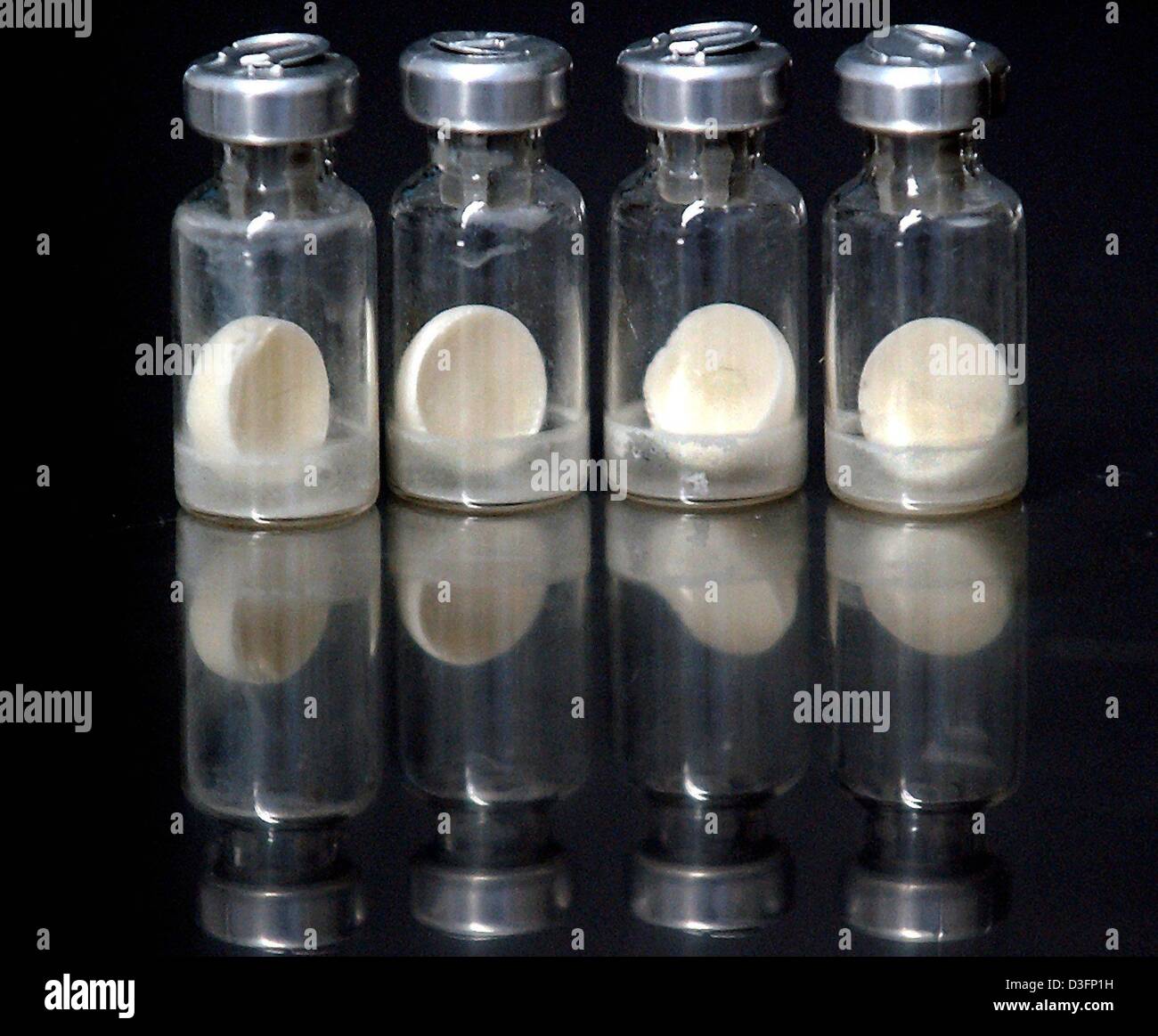 (dpa) - Little ampullas with smallpox vaccine stand on a table in the ...