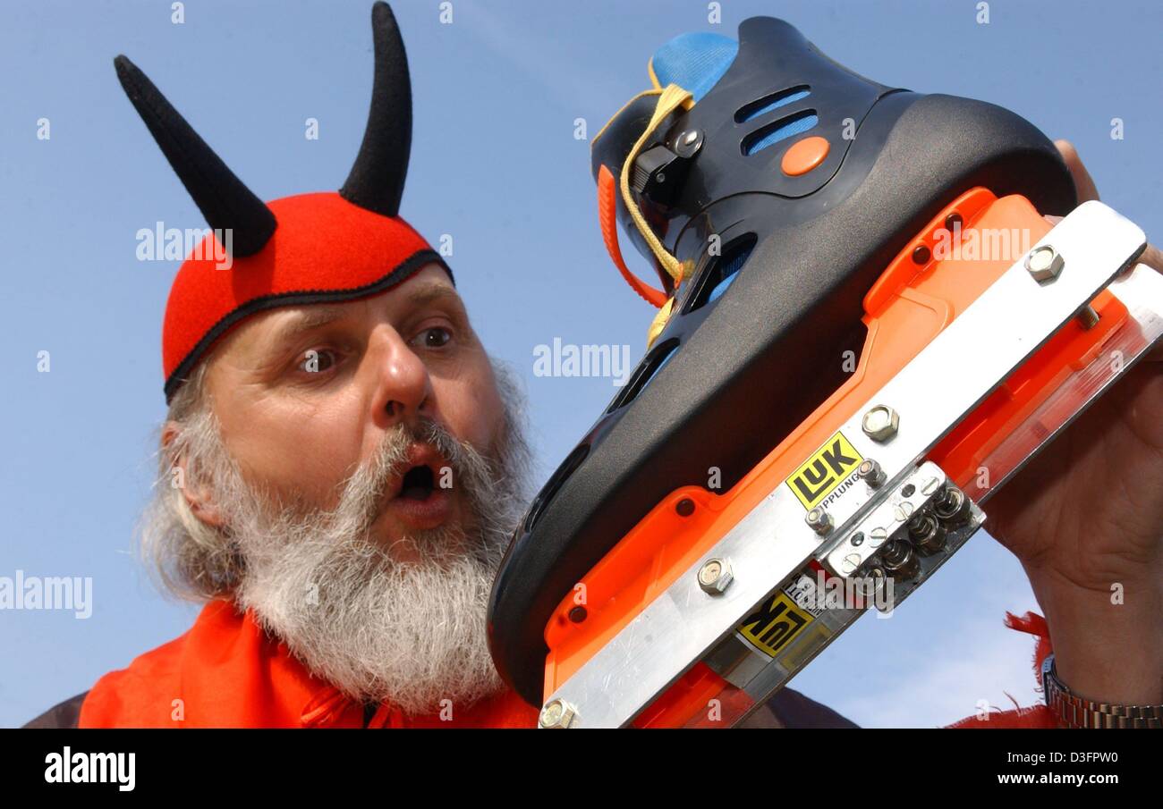 (dpa) - Bicycle designer Dieter 'Didi' Senft, dressed in a devil's ...