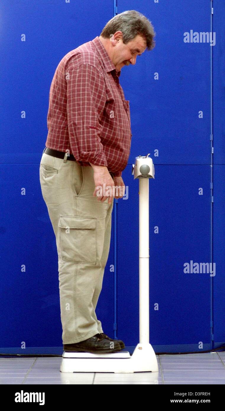 Weighing scales fat overweight germany hi-res stock photography and ...