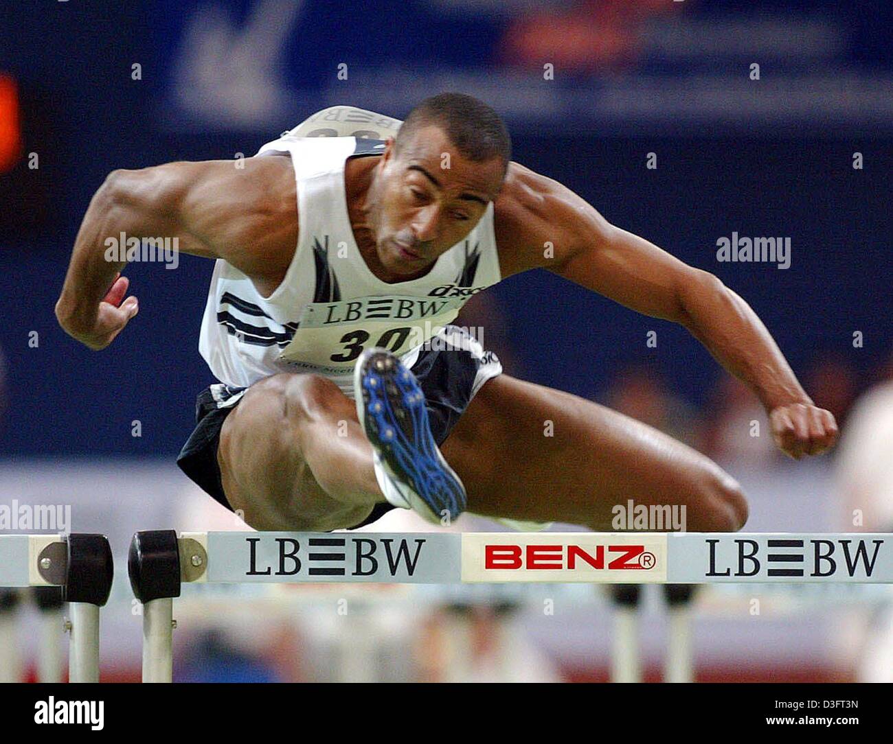 (dpa) - England's Colin Jackson clears a hurdle during the 60m hurdle ...