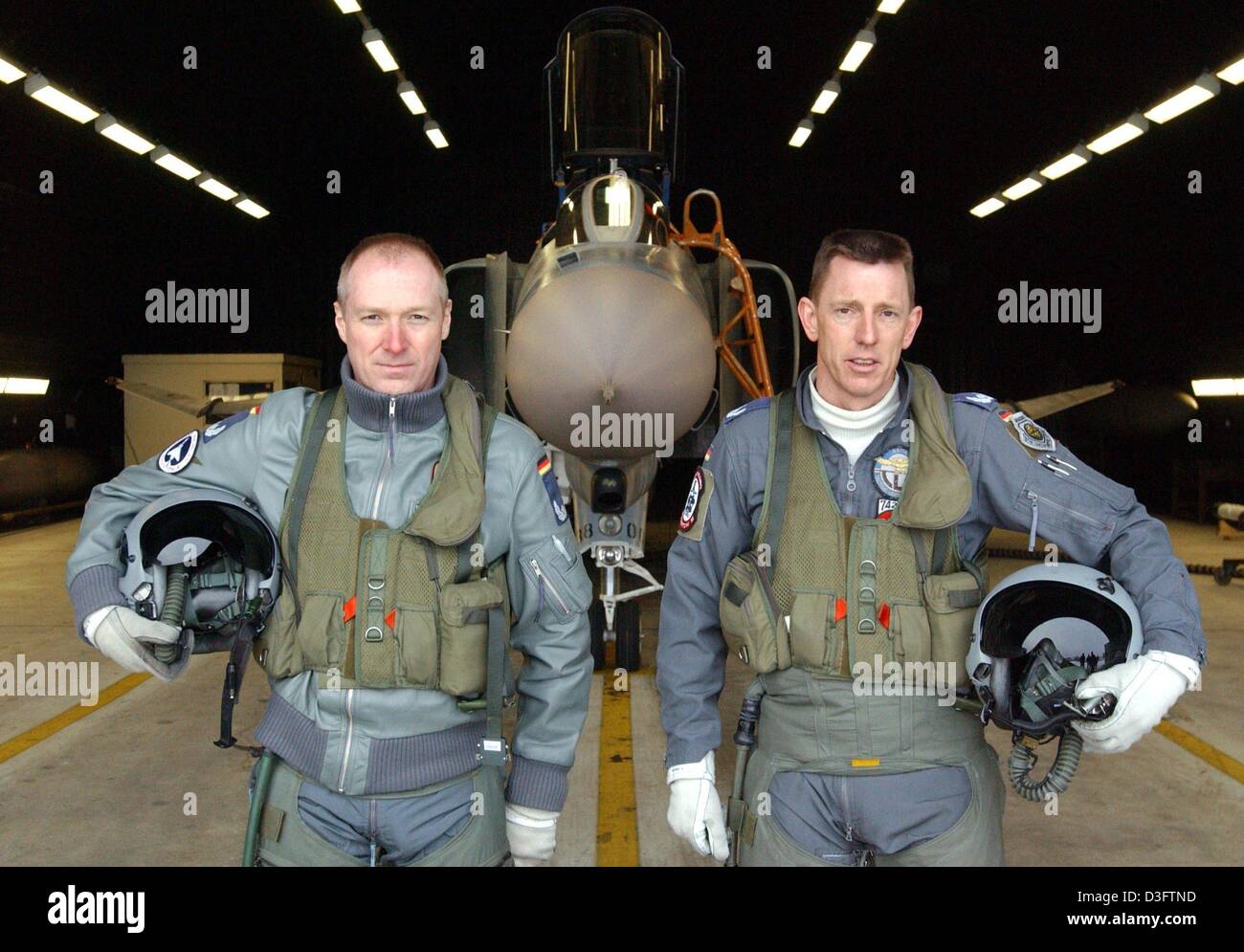 (dpa) - Two pilots pose in front of their warplane, a Mc Donnell ...