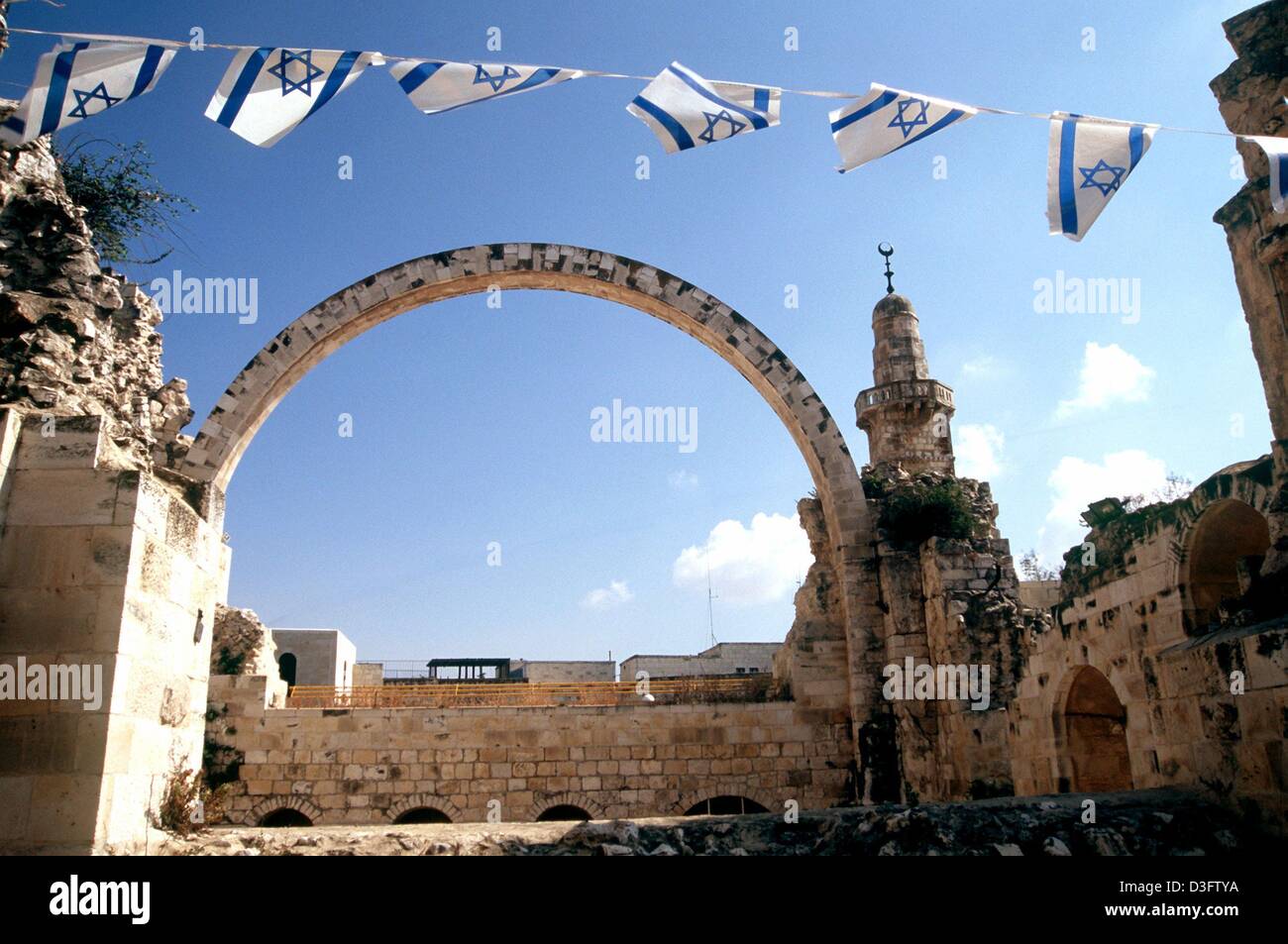 (dpa files) - Israeli flags fly in front of the Arch of the Hurva ...
