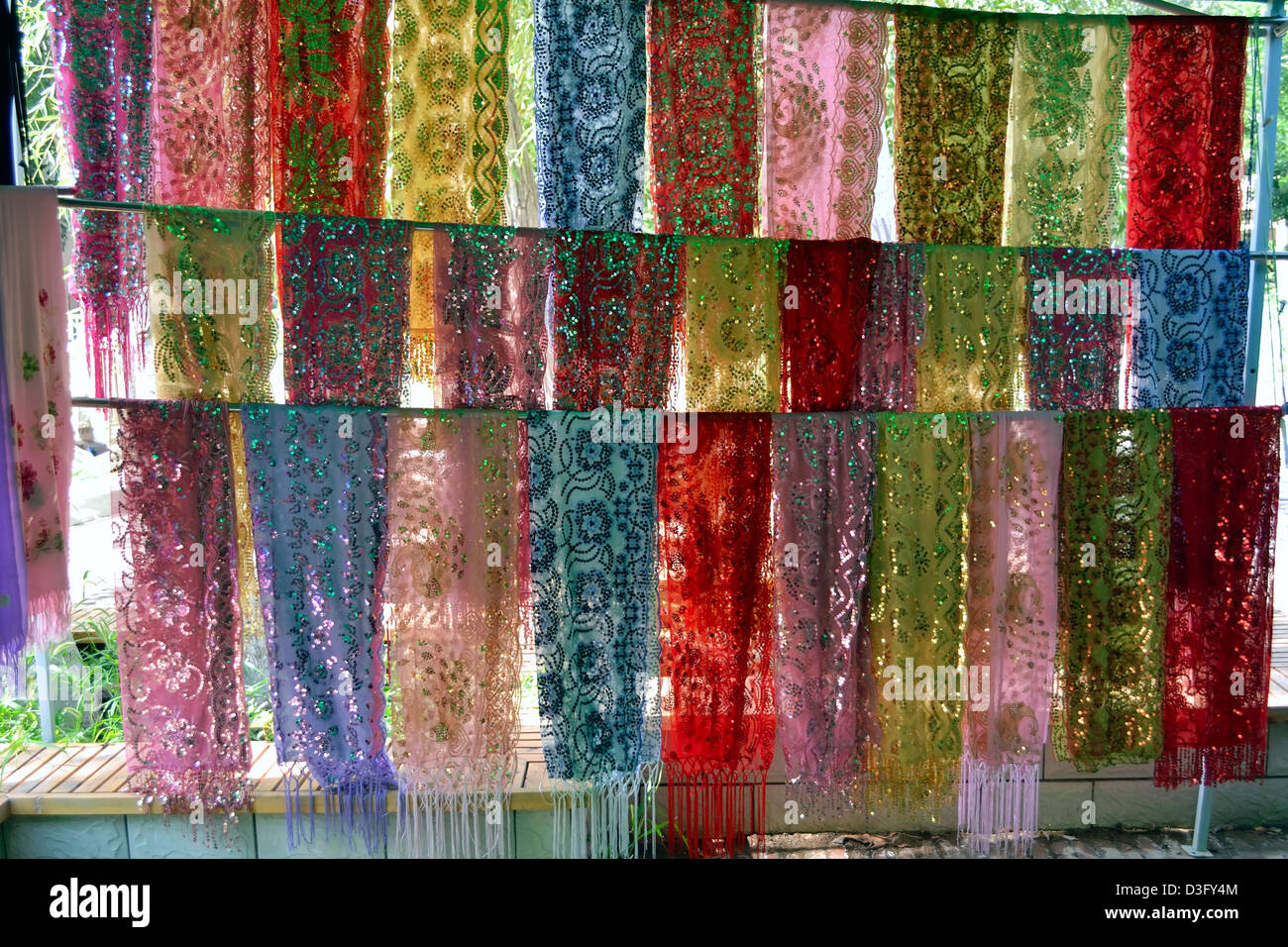 market stall selling textile on the Silk road, China Stock Photo - Alamy