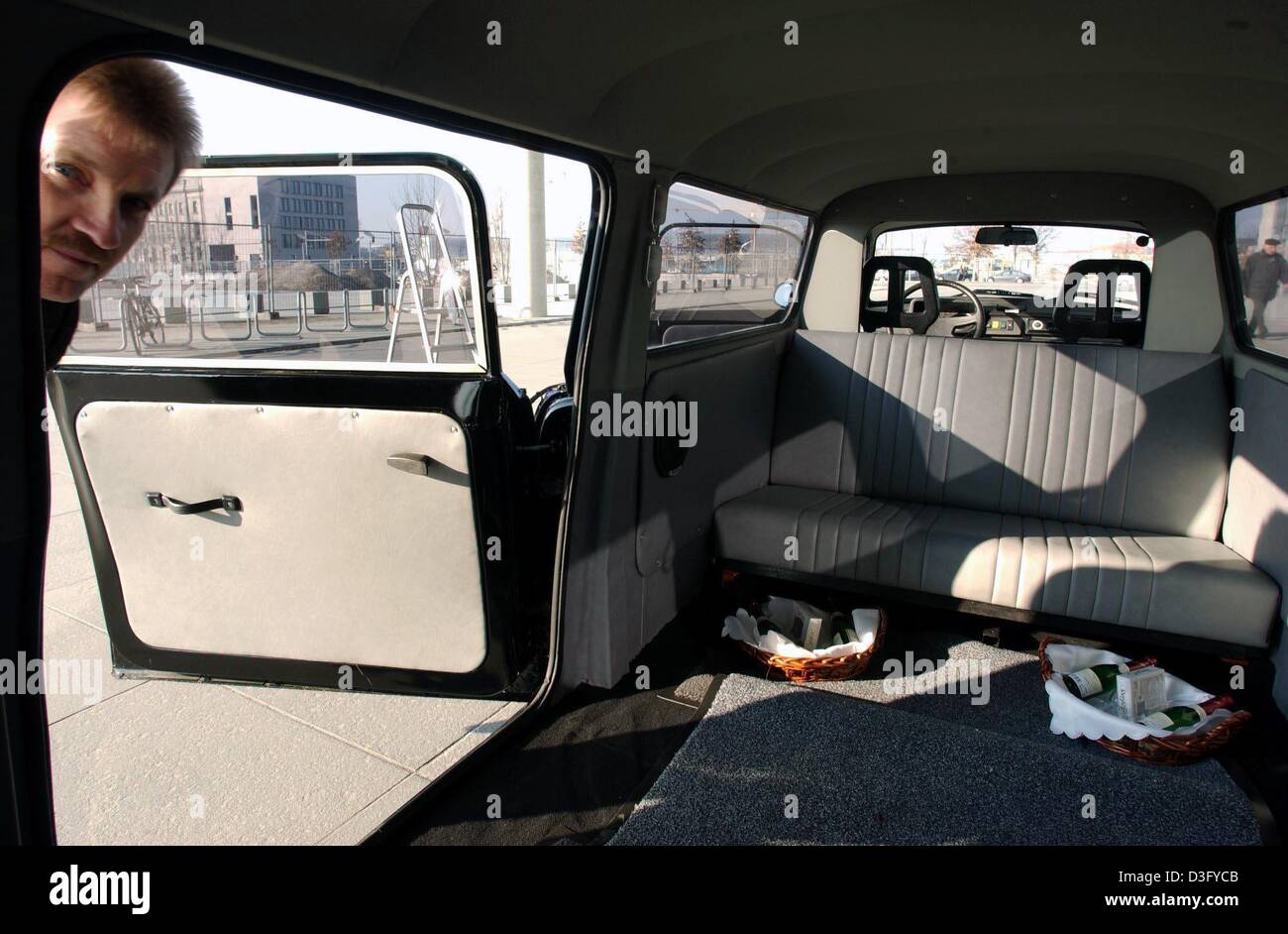 (dpa) - Sven Gronau runs a double check on the interior of his black ...