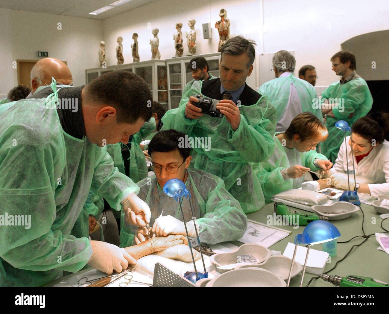 (dpa) - Renowned hand surgeons practice the newest plastic surgery ...